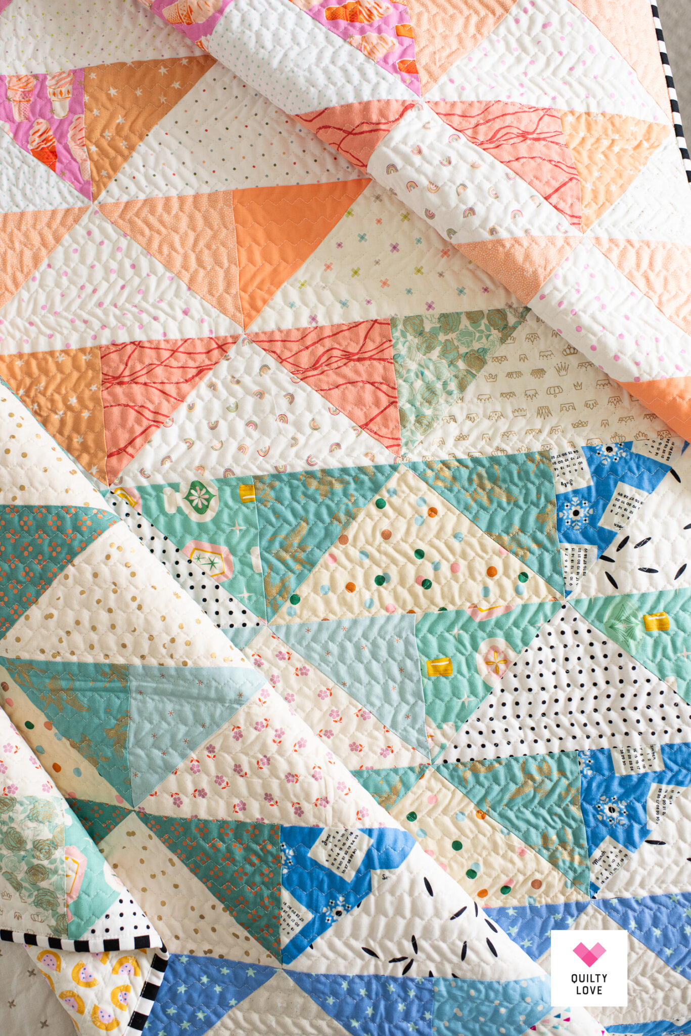 Scrappy Rainbow Patchwork Flying Geese quilt - Quilty Love