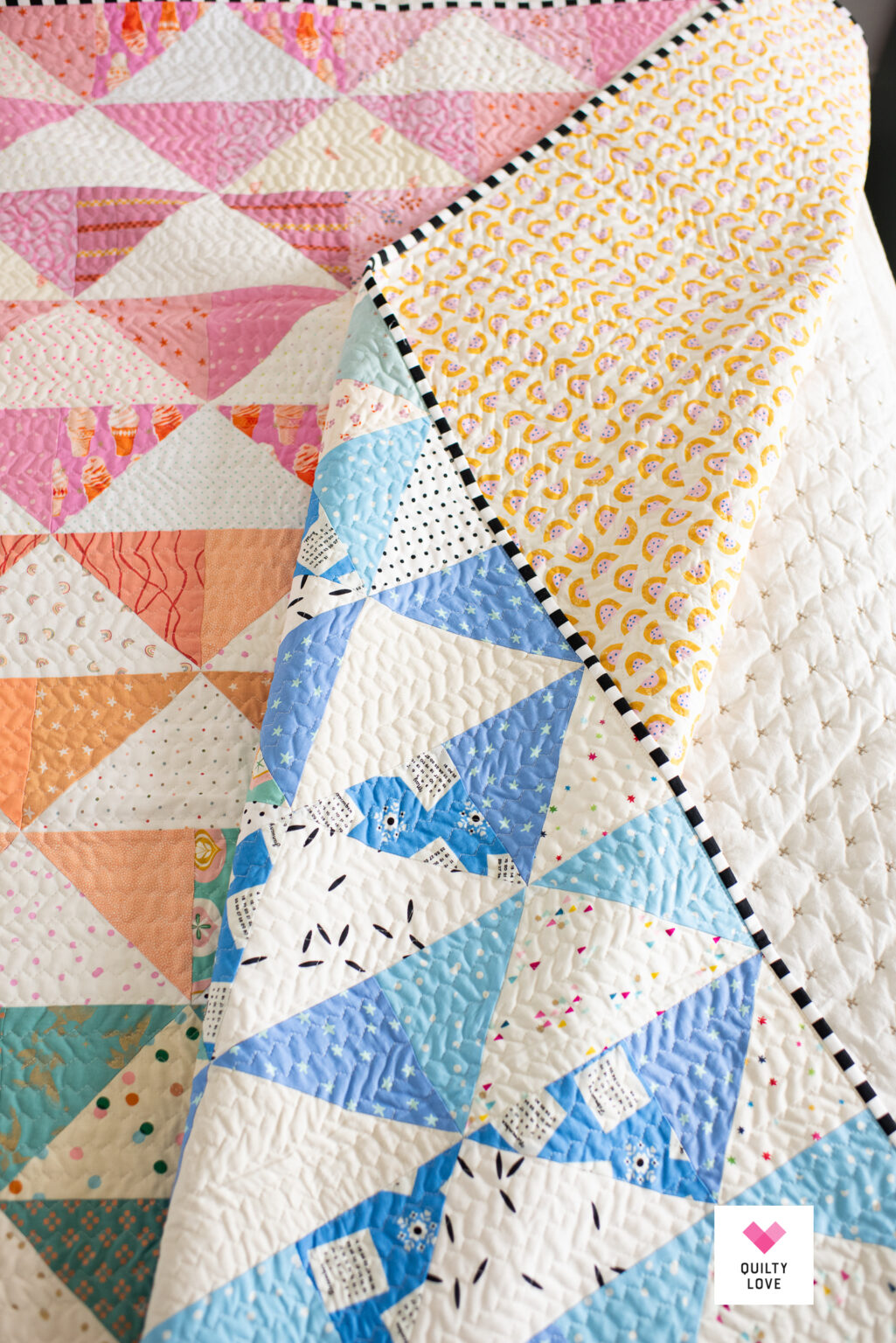 Scrappy Rainbow Patchwork Flying Geese quilt - Quilty Love