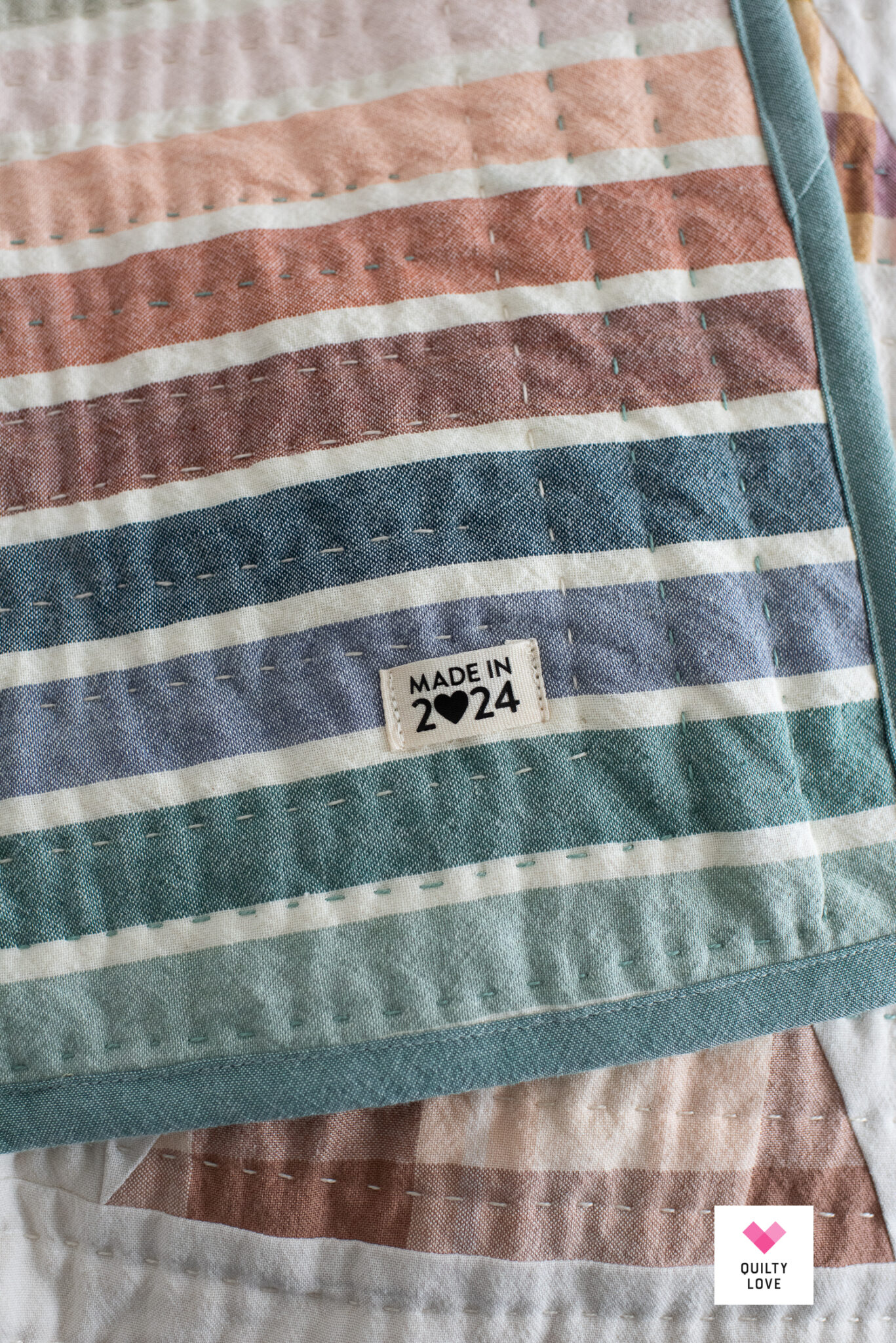 Hand quilted Fableism Arcade Plaid Wovens Triangle Pop quilt - Quilty Love
