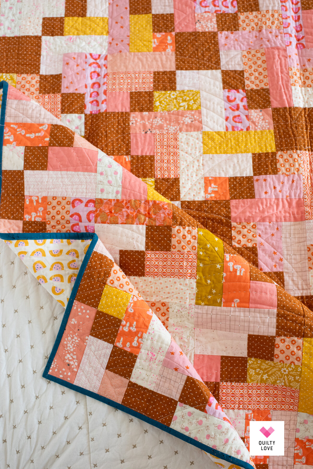 Scrappy Gems quilt - a stash friendly Irish chain quilt - Quilty Love