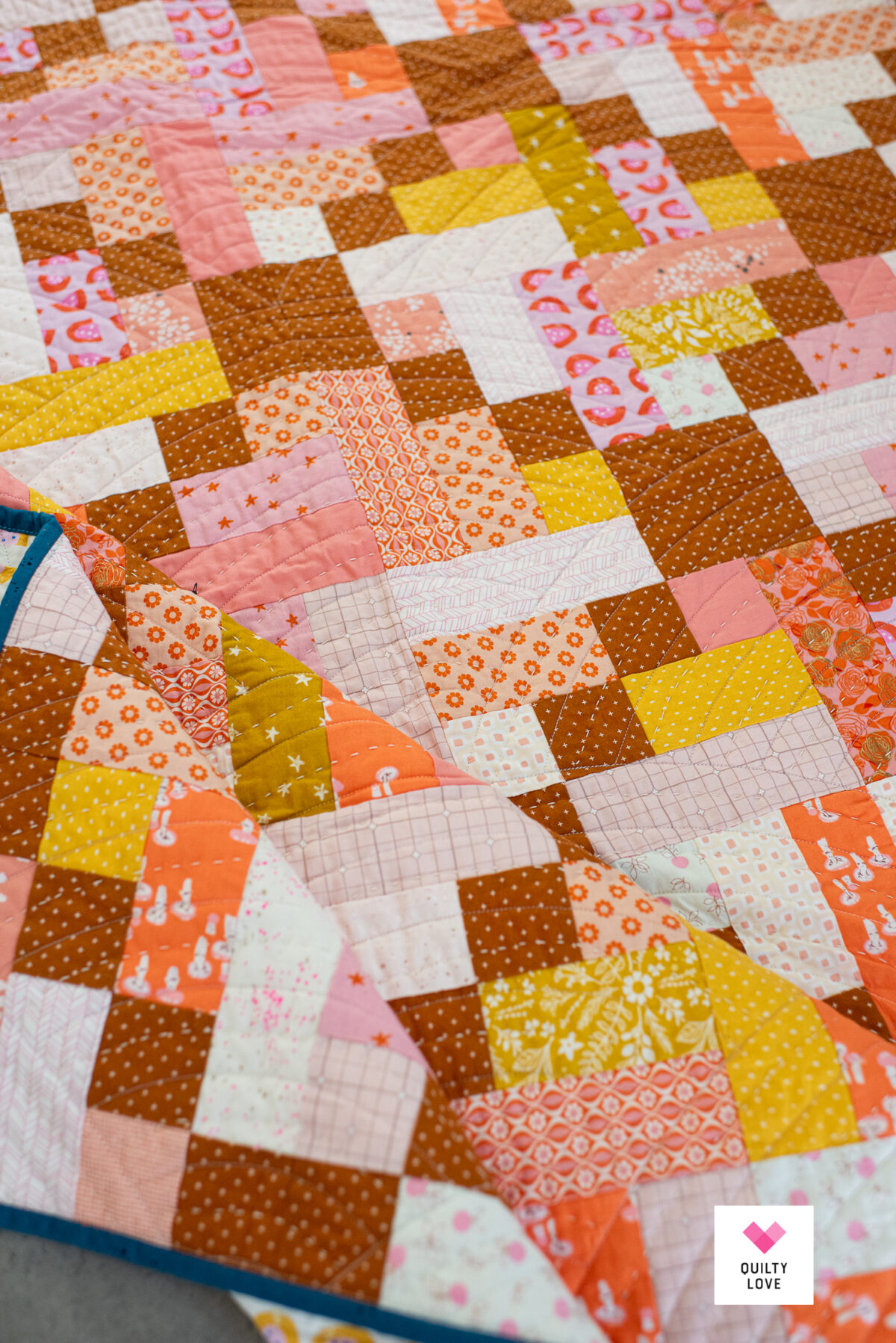 Scrappy Gems quilt - a stash friendly Irish chain quilt - Quilty Love