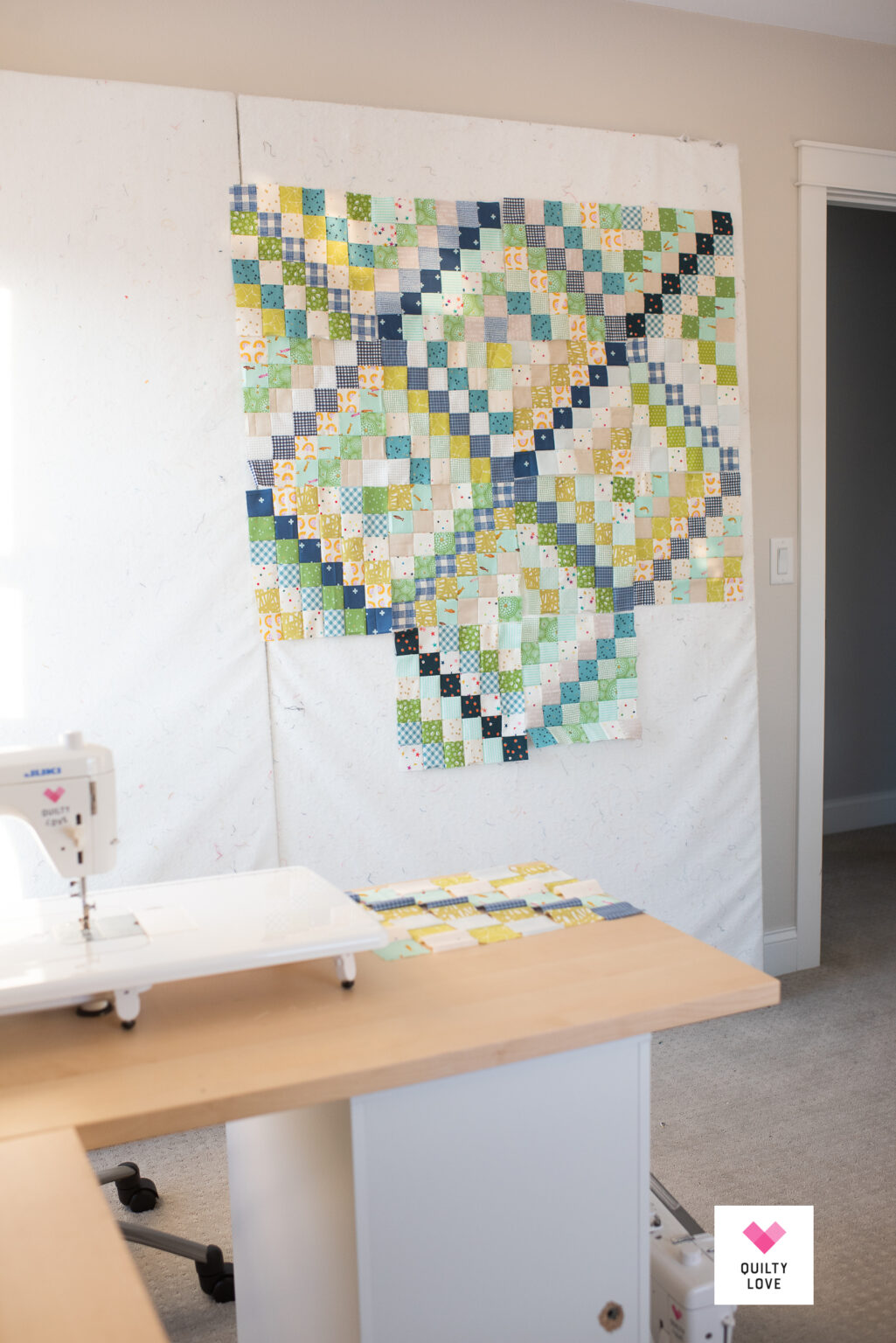 2 Scrappy Trip Around the World quilts - Quilty Love