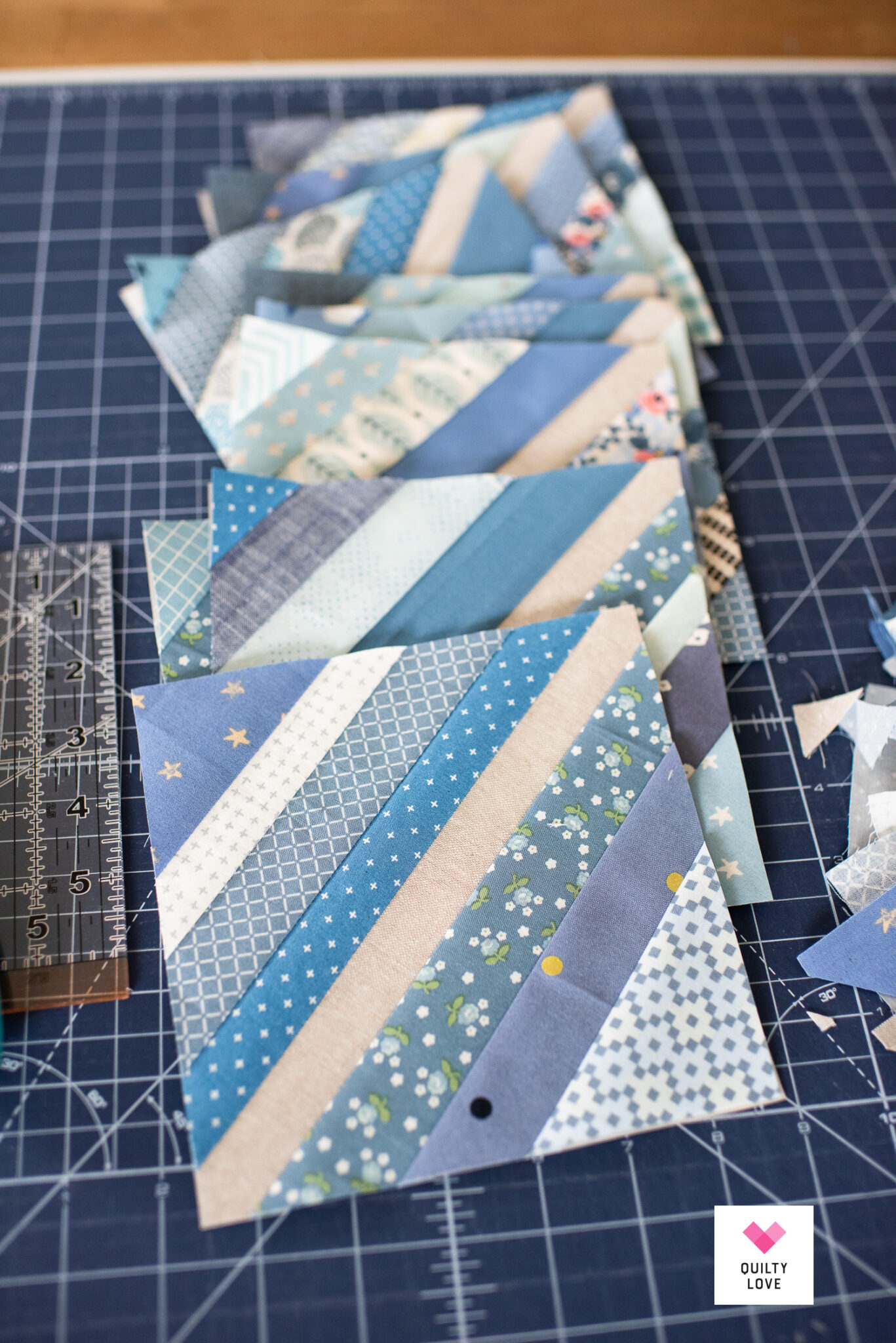 The blue String Scrap Stash Quilt - Quilty Love