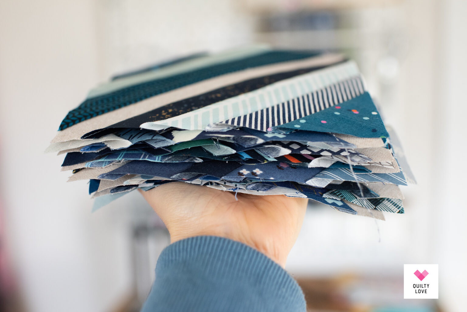 The blue String Scrap Stash Quilt - Quilty Love