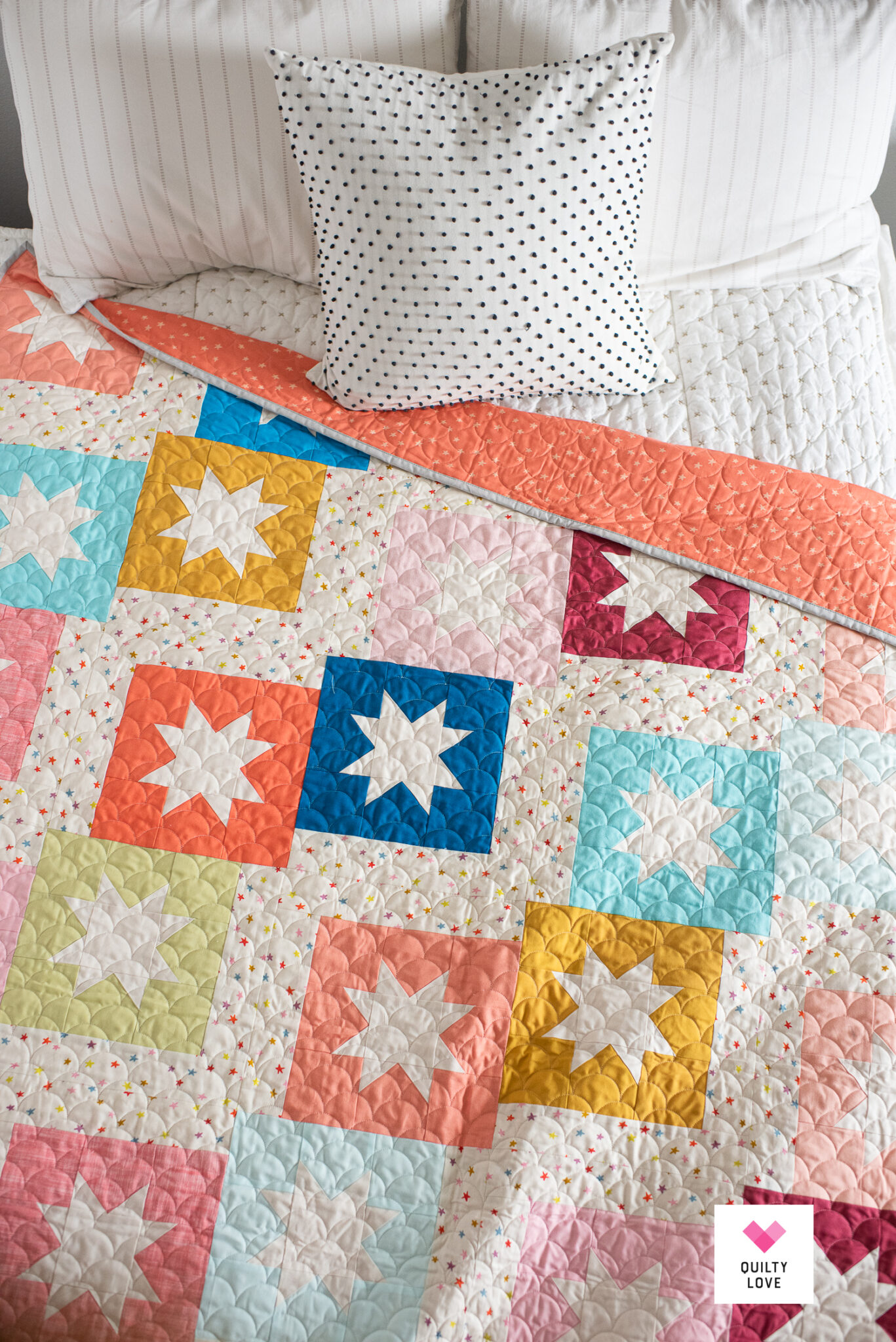 Stepping Stars quilt made with solids and Starry fabric - Quilty Love